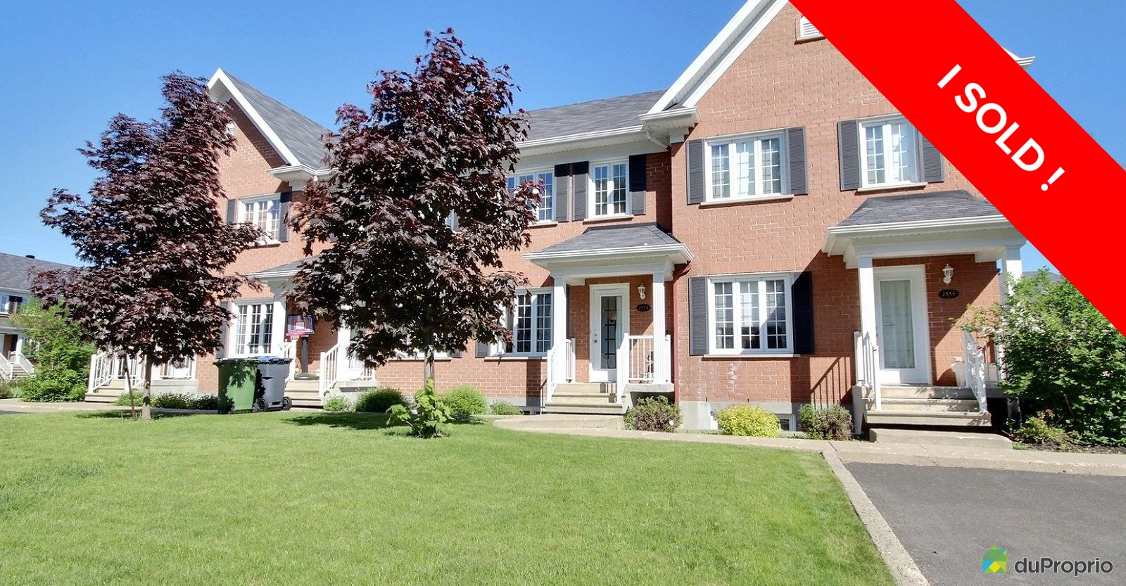 exterieur-maison-en-rangee-de-ville-st-romuald-1600-7568495-sold.jpg