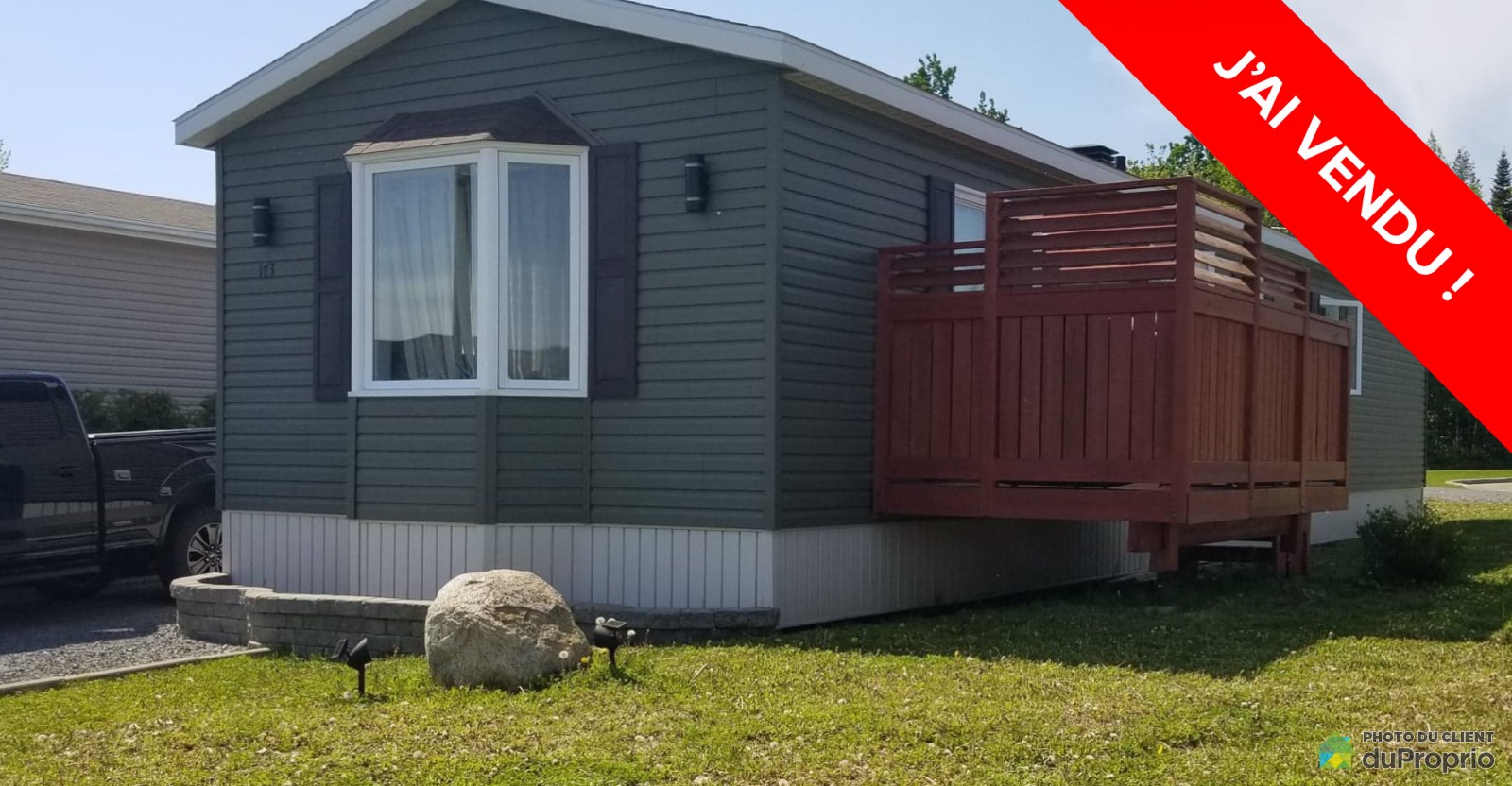 facade-en-ete-maison-mobile-beauport-1600-10307928-vendu.jpg