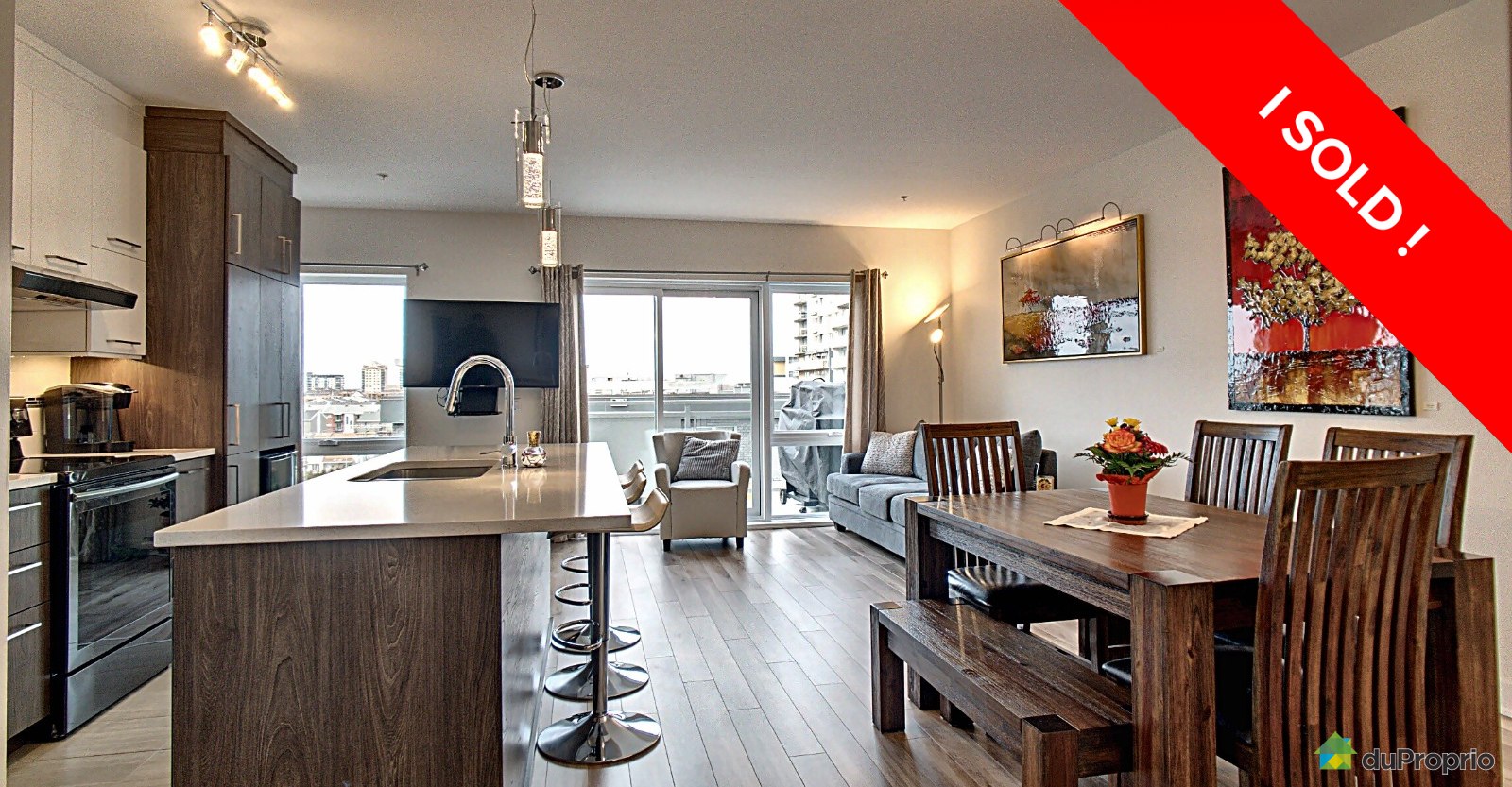 salle-a-manger-salon-condo-laval-des-rapides-1600-11800350-sold.jpg