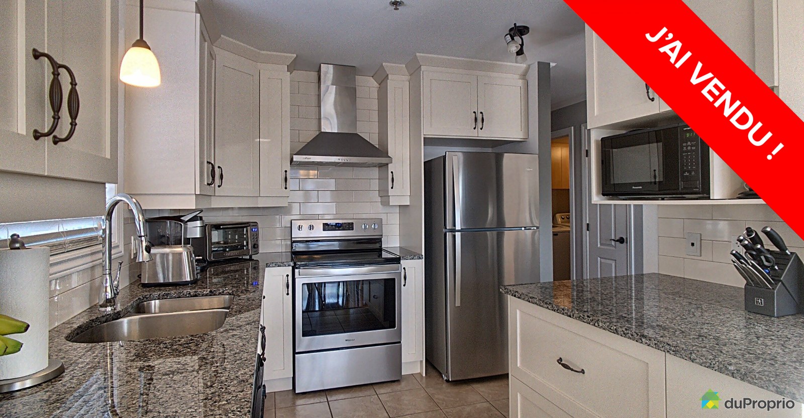 cuisine-condo-ste-rose-1600-11966300-vendu.jpg