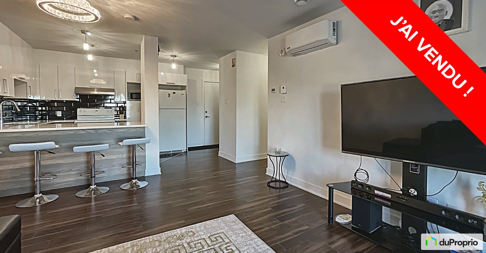 salon-du-logement-condo-pointe-aux-trembles-1600-14055359-vendu.jpg